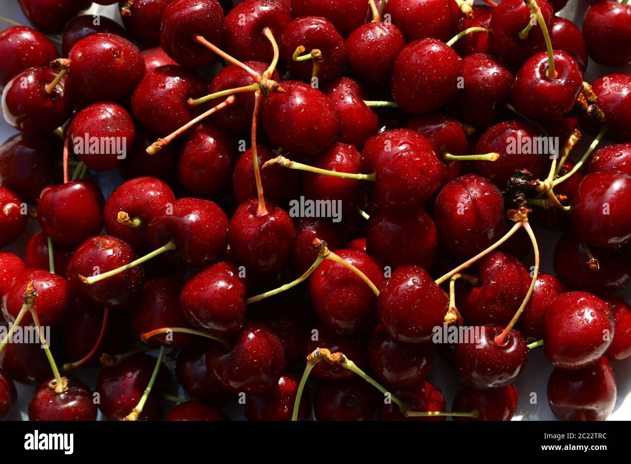 Fresh red cherries, fruits of the summer season Stock Photo - Alamy