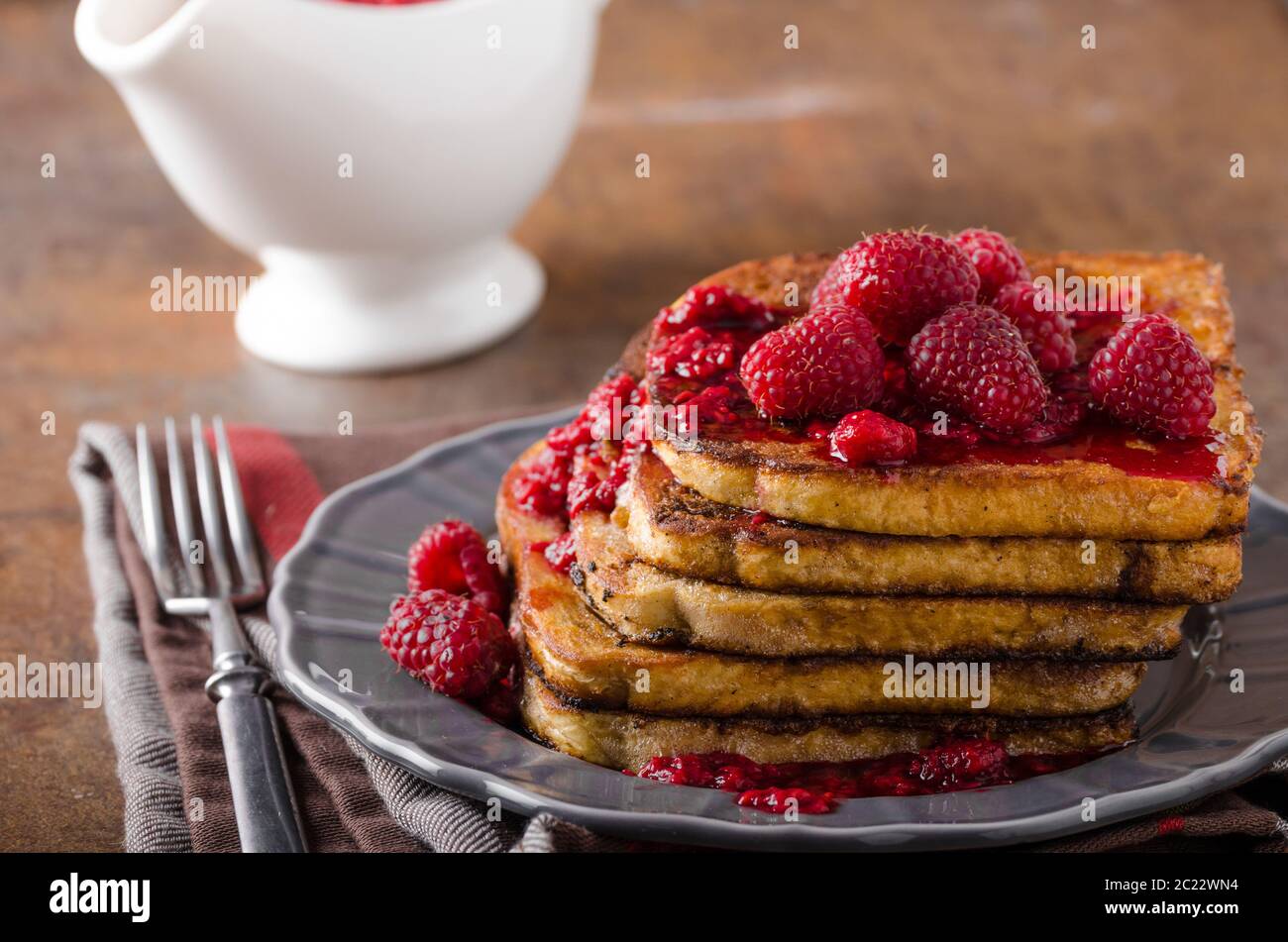 French toast with raspberry reduction sauce, all homemade Stock Photo ...