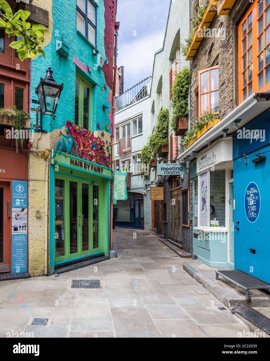An empty colorful alleyway of Neal's Yard in London during the pandemic ...