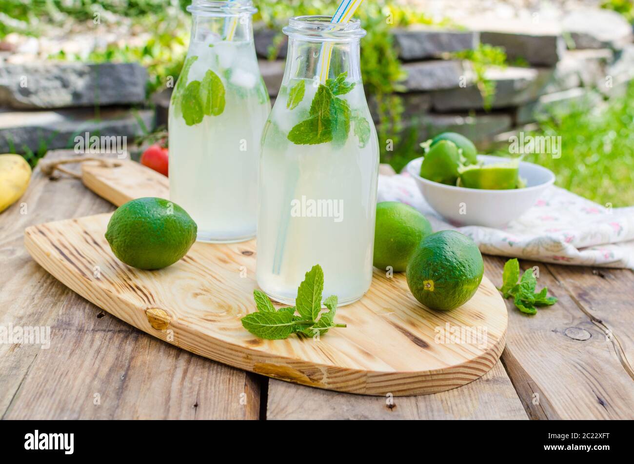 Homemade mint lemonade with lime, outside ready to drink Stock Photo ...