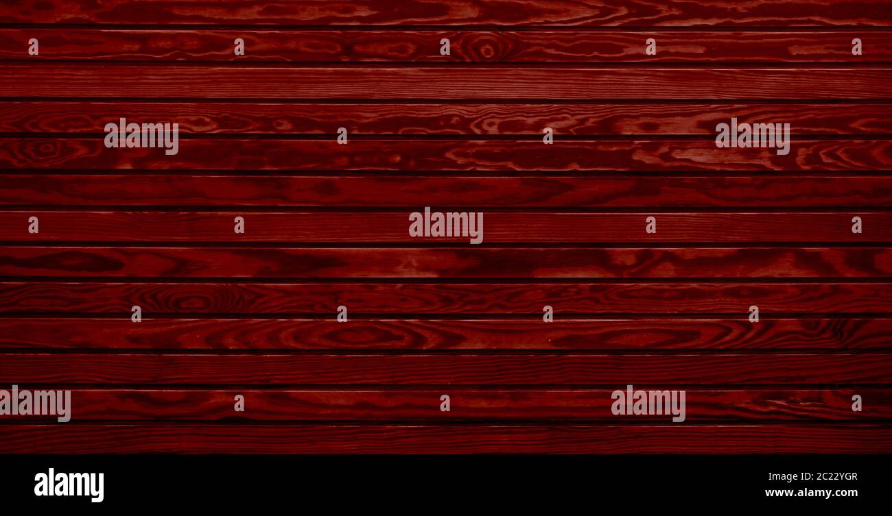 Natural wooden planks with red color - Wood background Stock Photo - Alamy