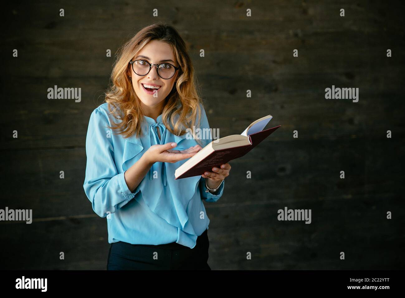 Elegant woman reading interesting book hi-res stock photography and ...