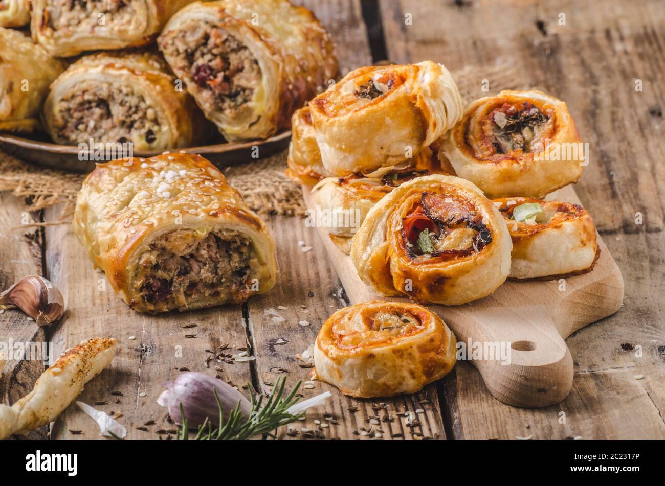 Sticks puff pastry, topped with spice, baked in oven, rustic photo ...