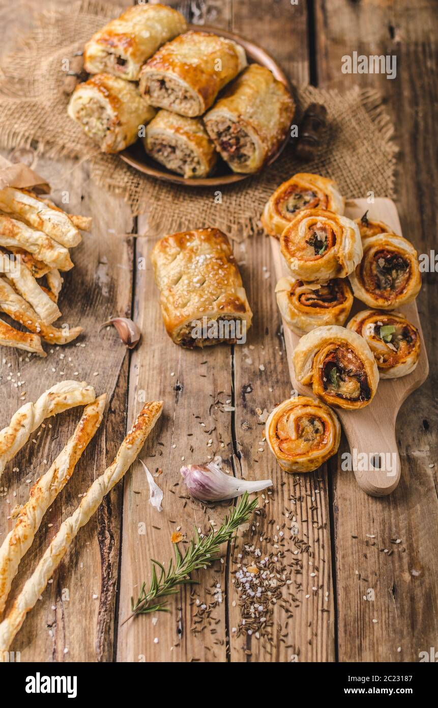 Sticks puff pastry, topped with spice, baked in oven, rustic photo ...