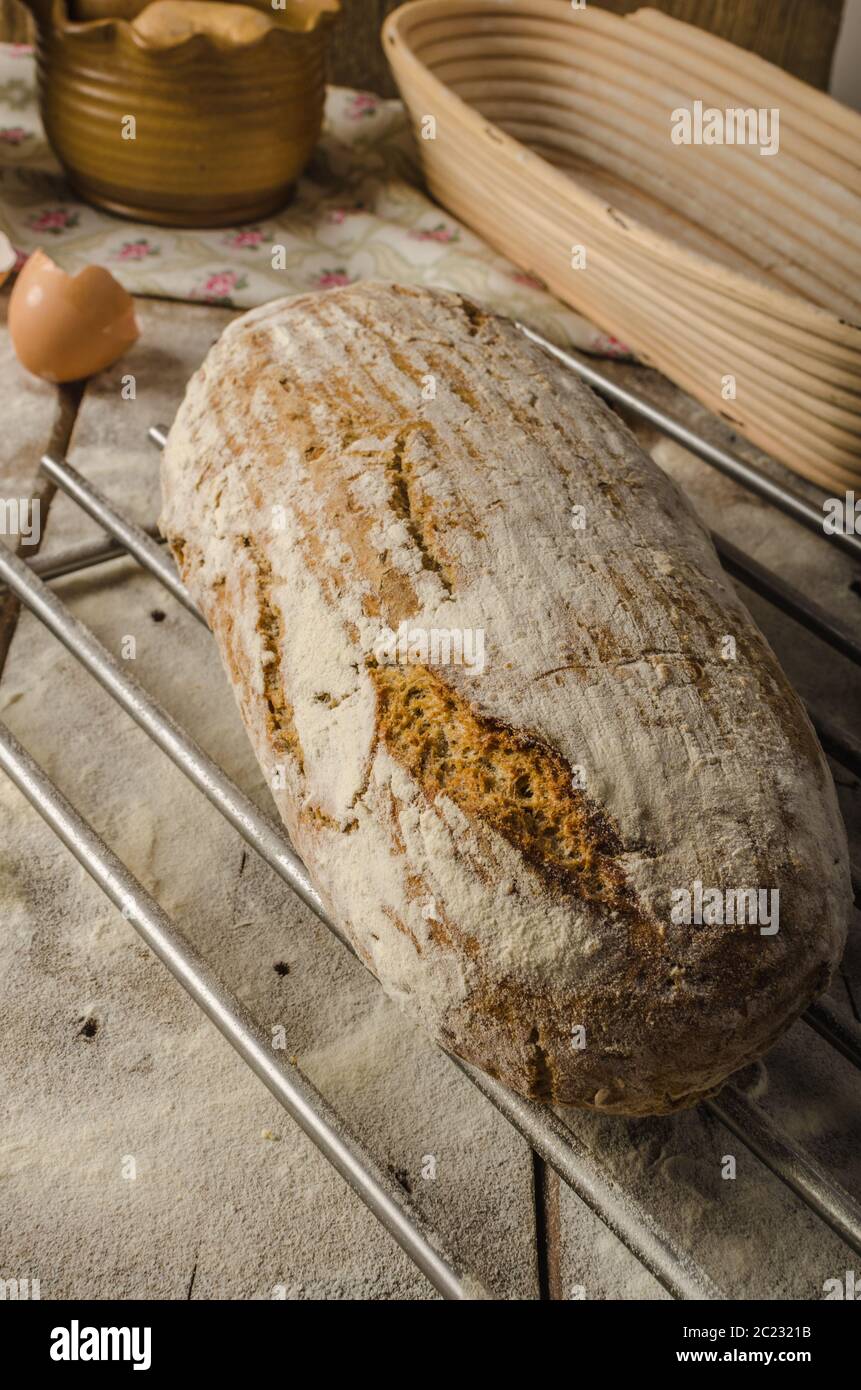 Homemade rustic bread, baked in oven, wheat leaven, breaded in a basket ...