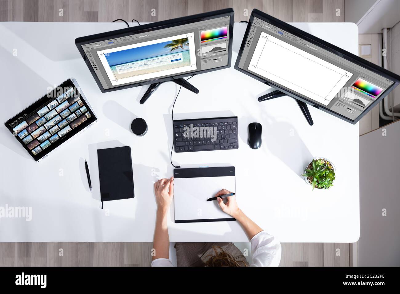 Female Editor Working With Photos On Computer Stock Photo - Alamy