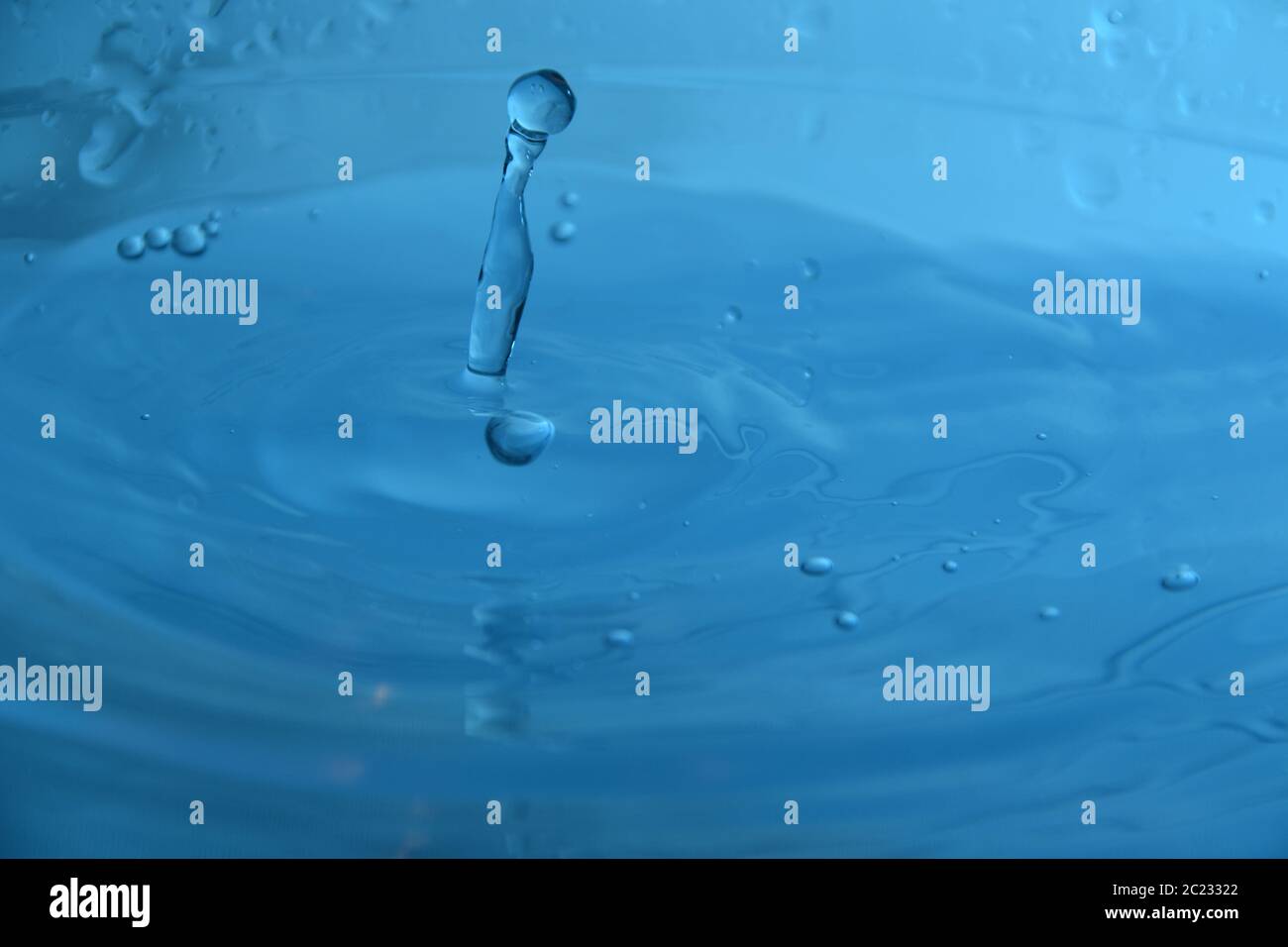 Drop of blue water Stock Photo - Alamy