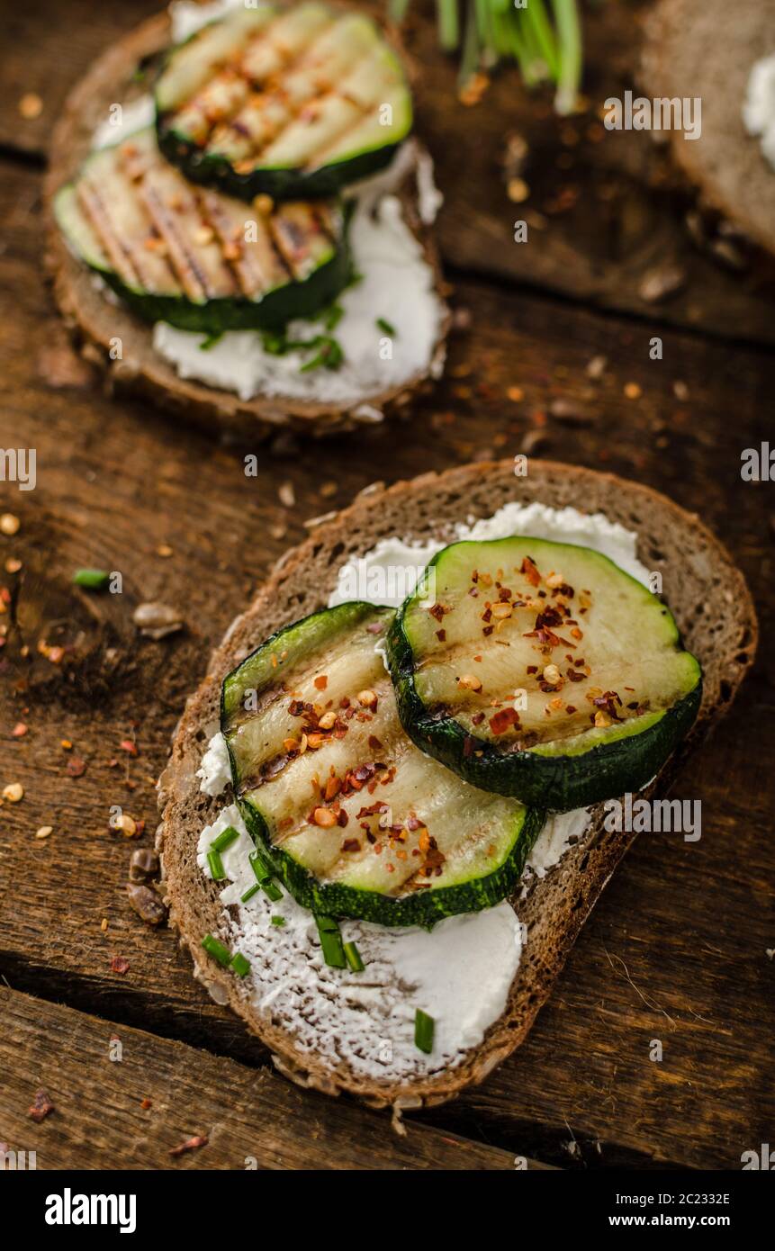 Healthy breakfast - seeds bread spread by cream cheese and grilled ...