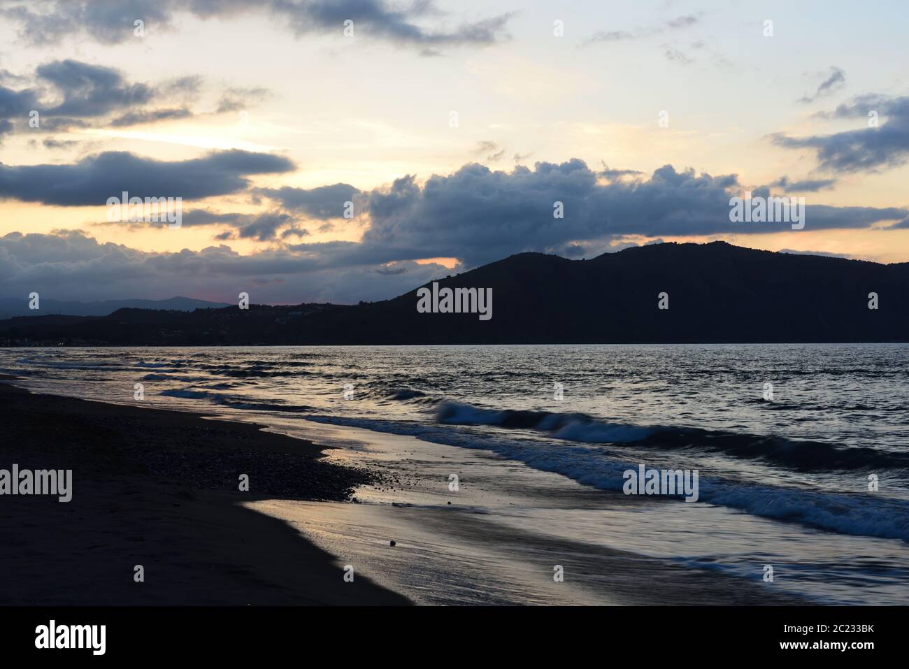 Sunset on Crete, Greece Stock Photo - Alamy