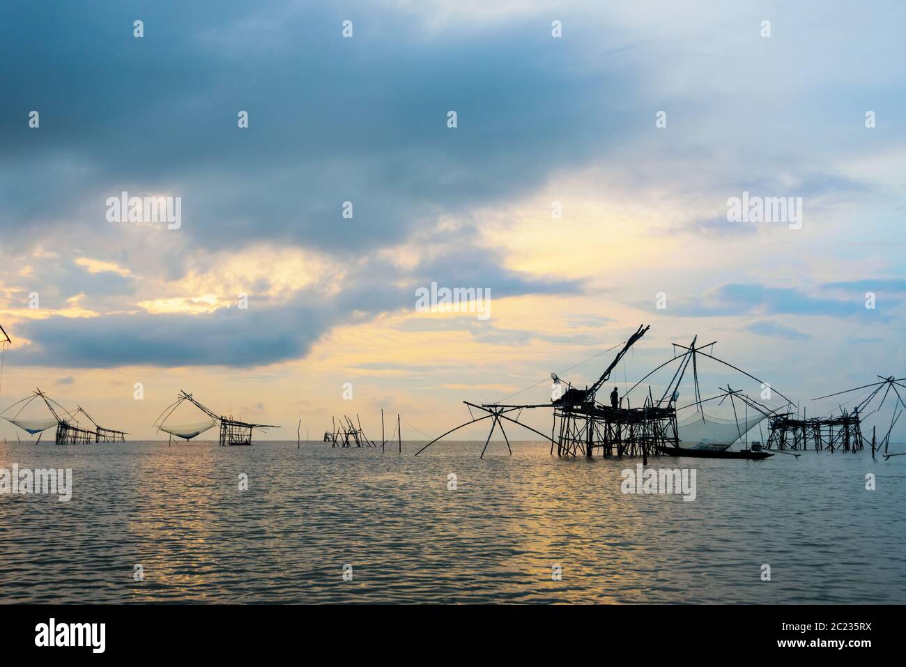 Beautiful nature landscape of Songkhla Lake at sunrise and fisherman ...