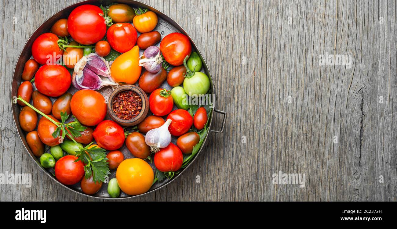 Autumn harvest of tomatoes.Canning tomatoes.Pickling of ripe tomatoes ...