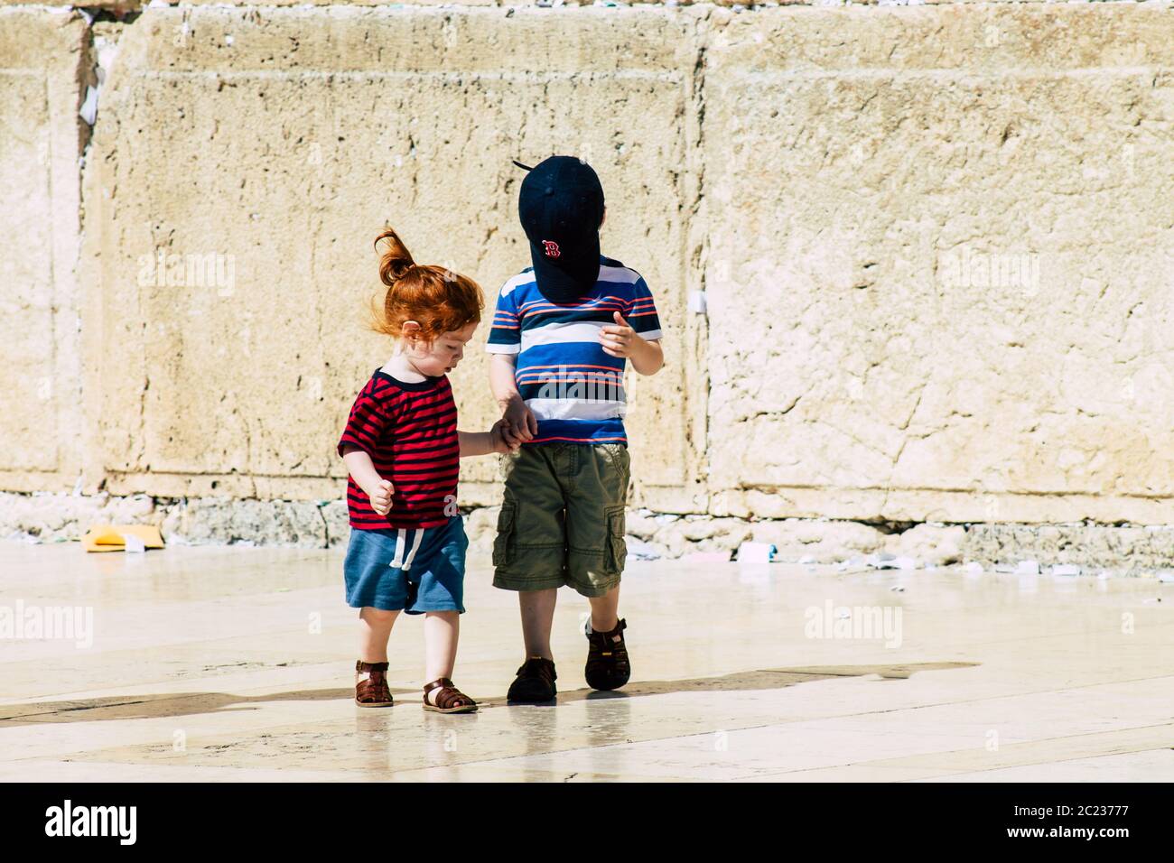 Jerusalem Israel June 19, 2019 View of young Israeli kid walking front ...