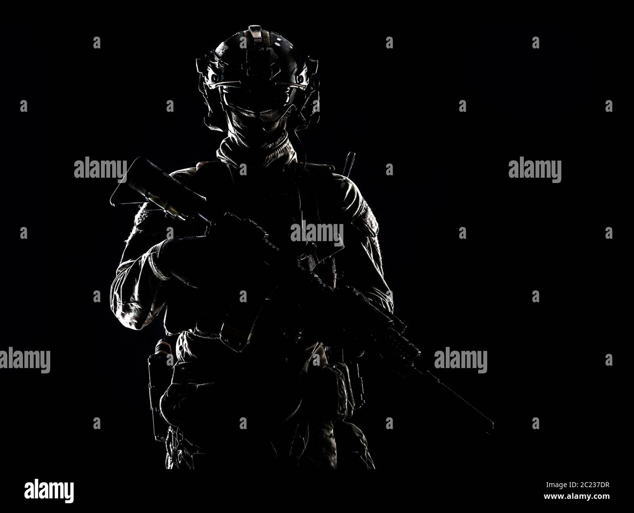 Low key studio portrait of army special forces elite soldier with ...