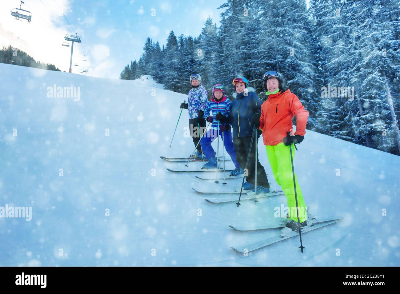 Children ski row hi-res stock photography and images - Alamy