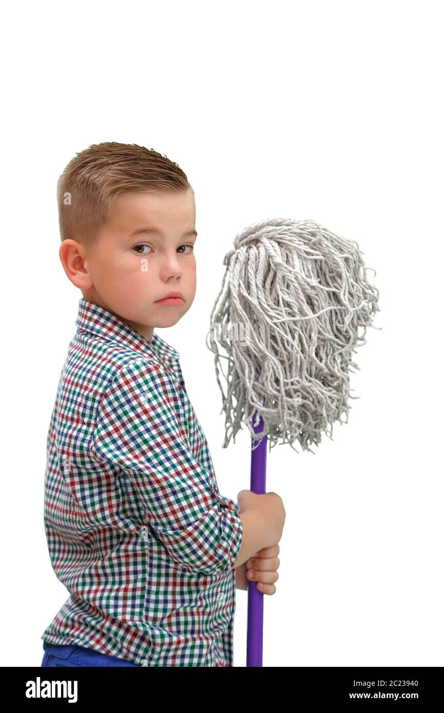 a small bald boy in a plaid shirt on a white isolated background stands ...