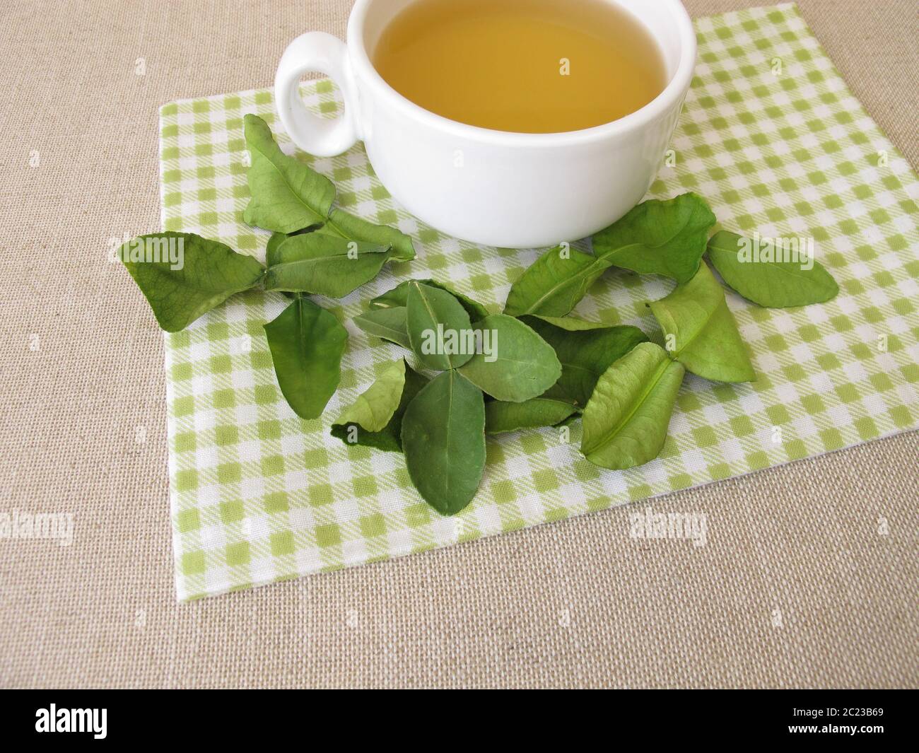 Tea with dried kaffir lime leaves Stock Photo - Alamy