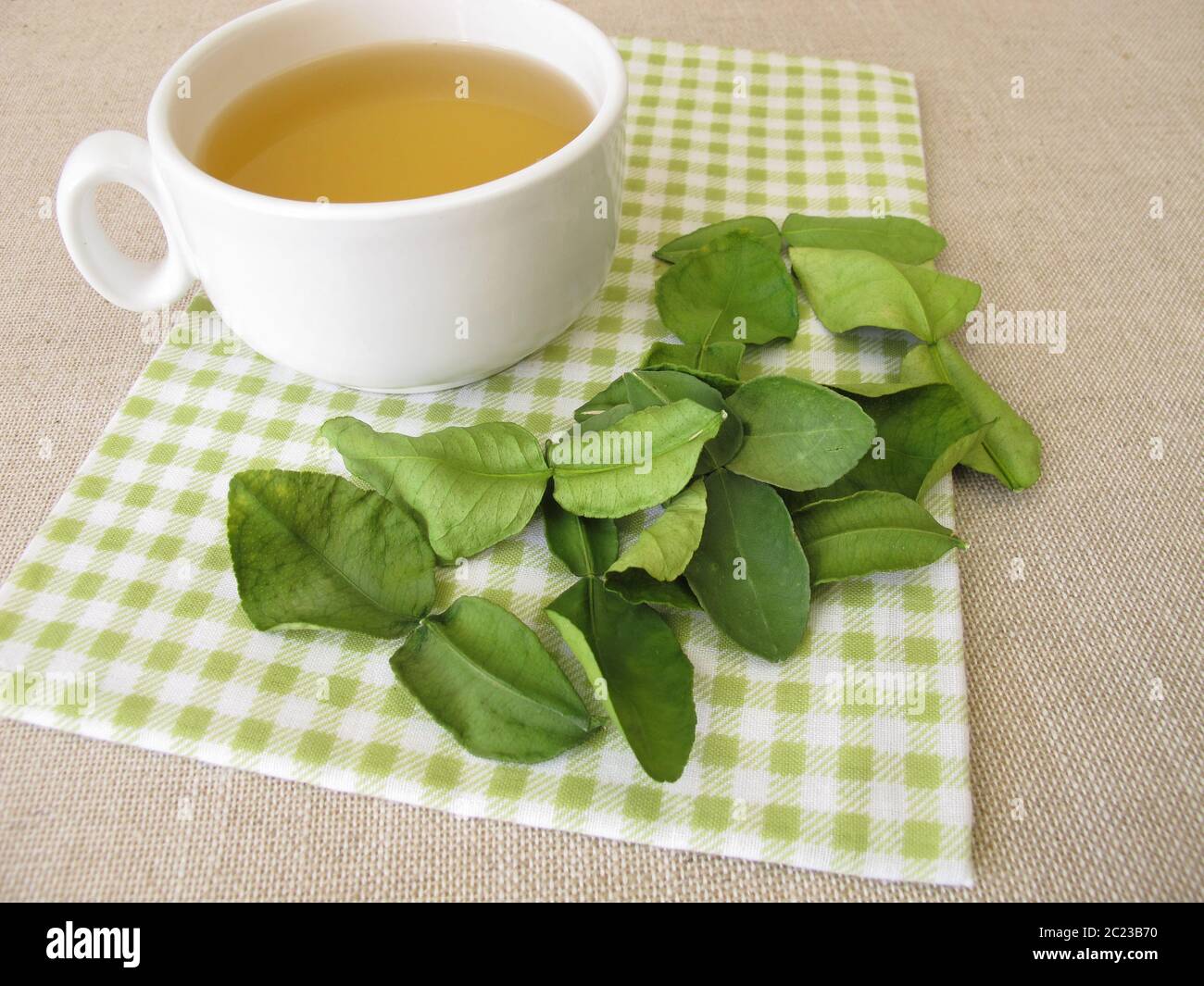 Tea with dried kaffir lime leaves Stock Photo - Alamy