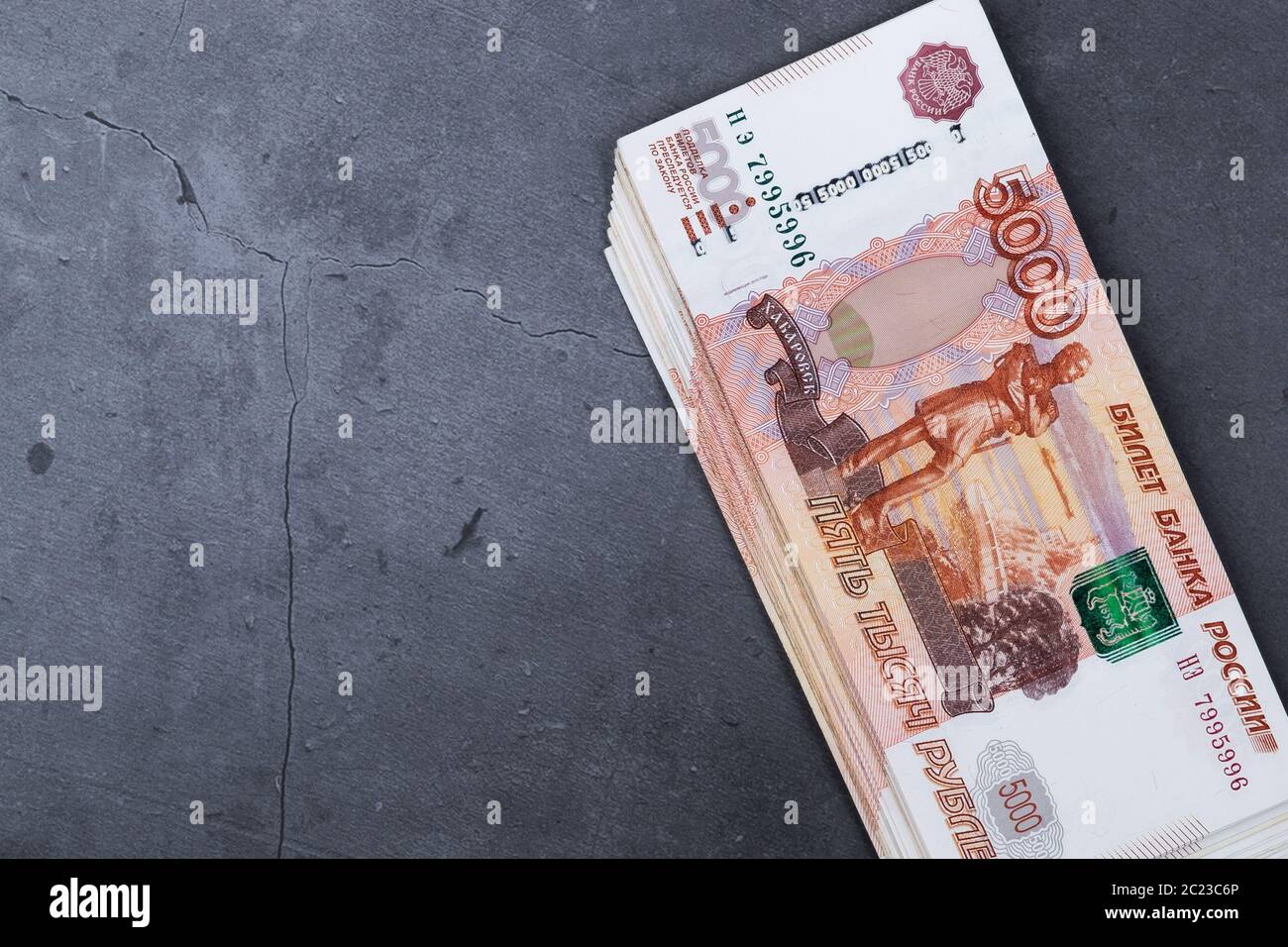 Big stack of Russian money banknotes of five thousand rubles lying on a ...