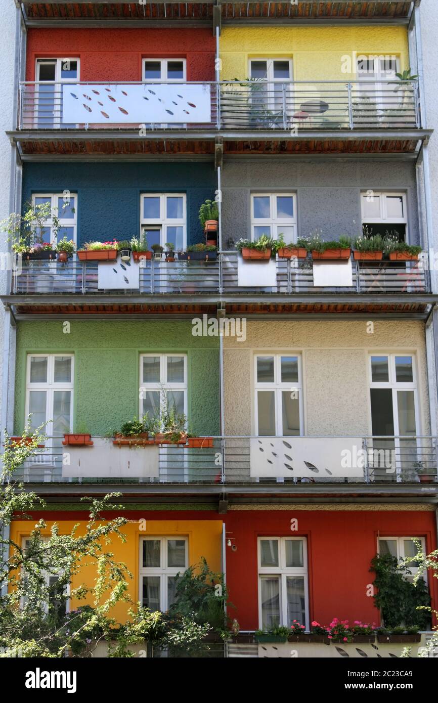 Coloured balcony windows Stock Photo - Alamy