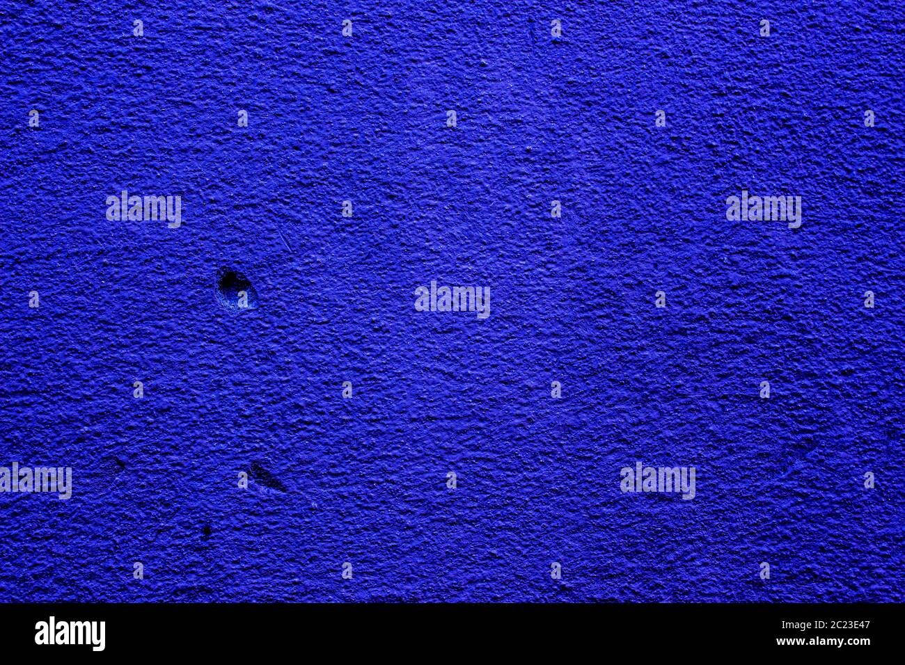 Blue colored abstract wall background with textures of different shades ...