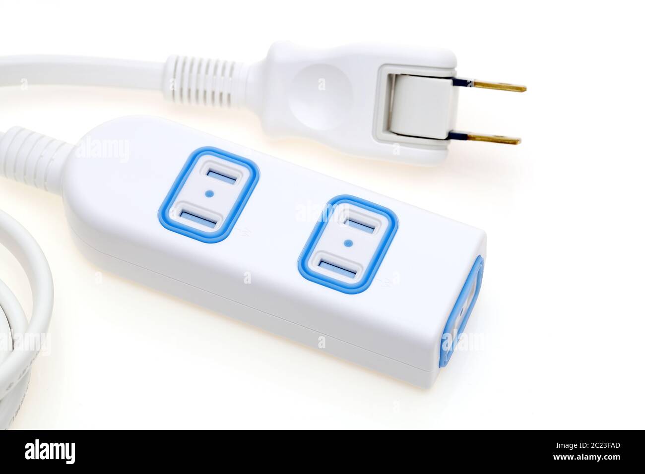Electric extension strip isolated on white background Stock Photo - Alamy