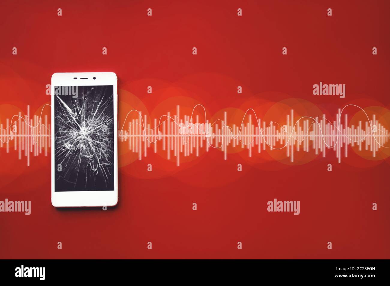 Digital Mobile Phone with broken black screen on red background with ...