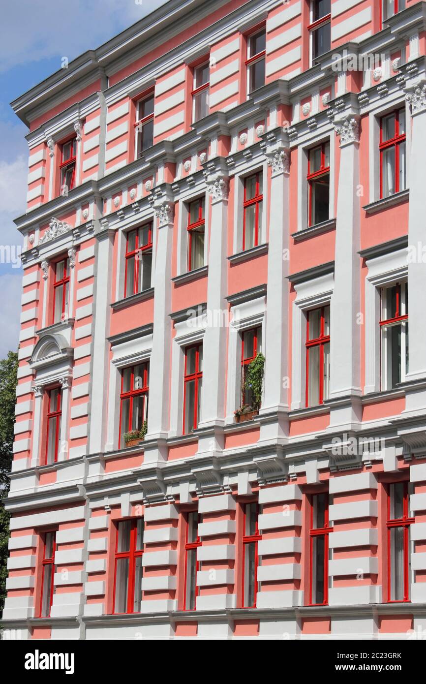 Red stucco house Stock Photo - Alamy