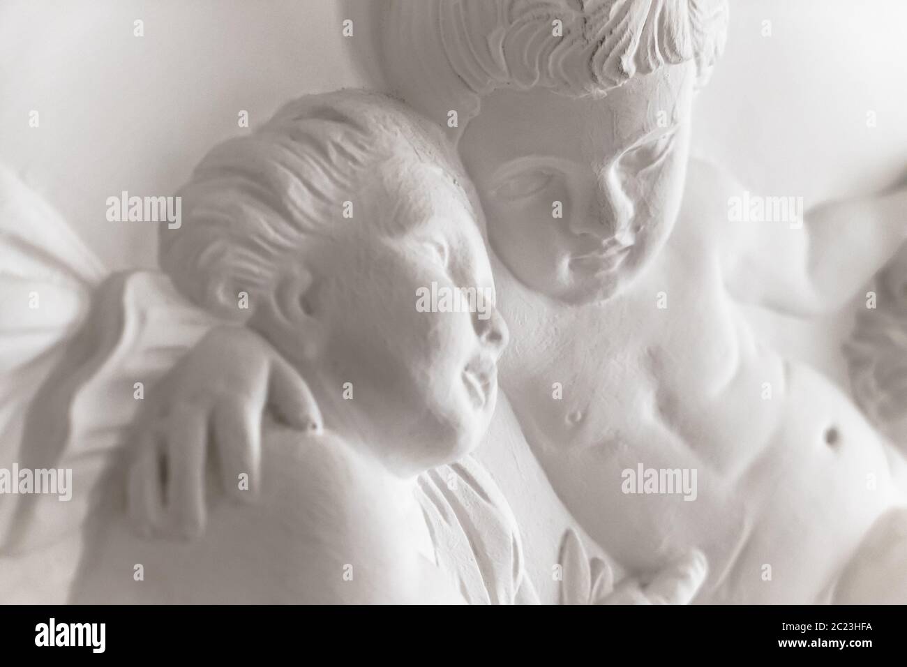 Architecture detail of white plaster statue with cherubs (putti). Ideal ...