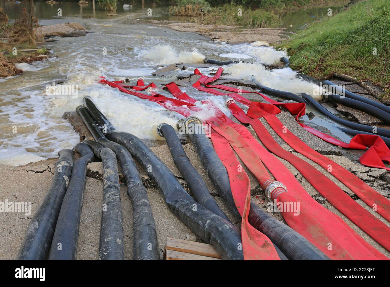 Pipes and Fire Hoses for Pumping Out Flood Water Stock Photo - Alamy