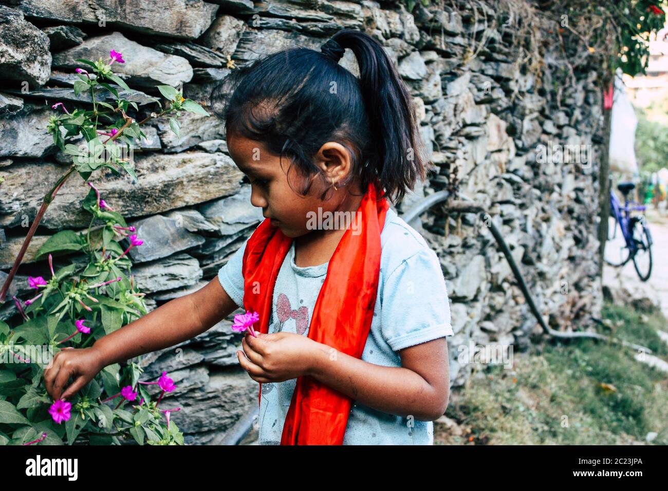 Nepalese children play in village hi-res stock photography and images ...