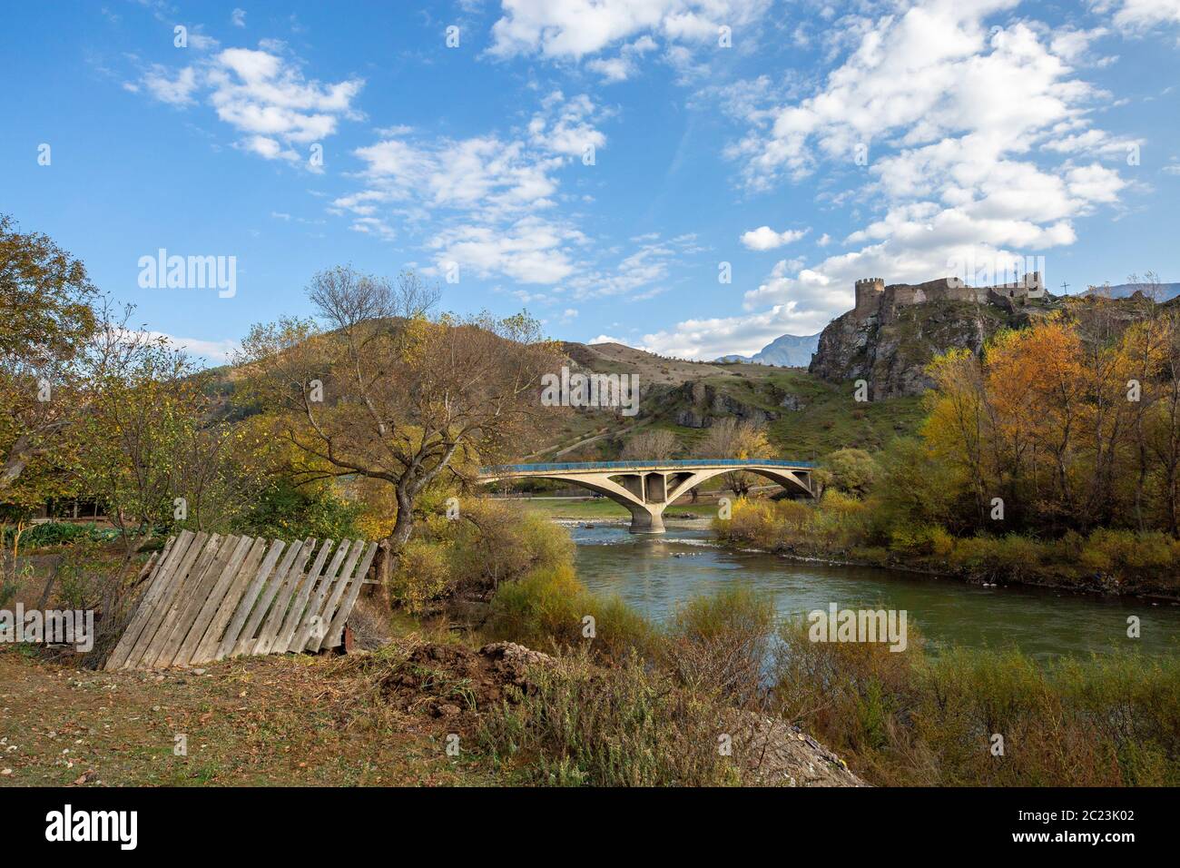 River Mtkvari known also as River Kura and Atskhuri Castle in autumn ...