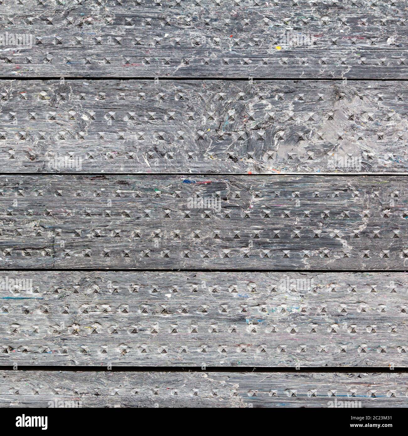construction background - stack of gray railroad ties made of recycled ...