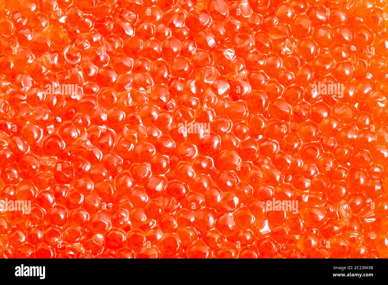 food background - salted russian red caviar of pink salmon fish close ...