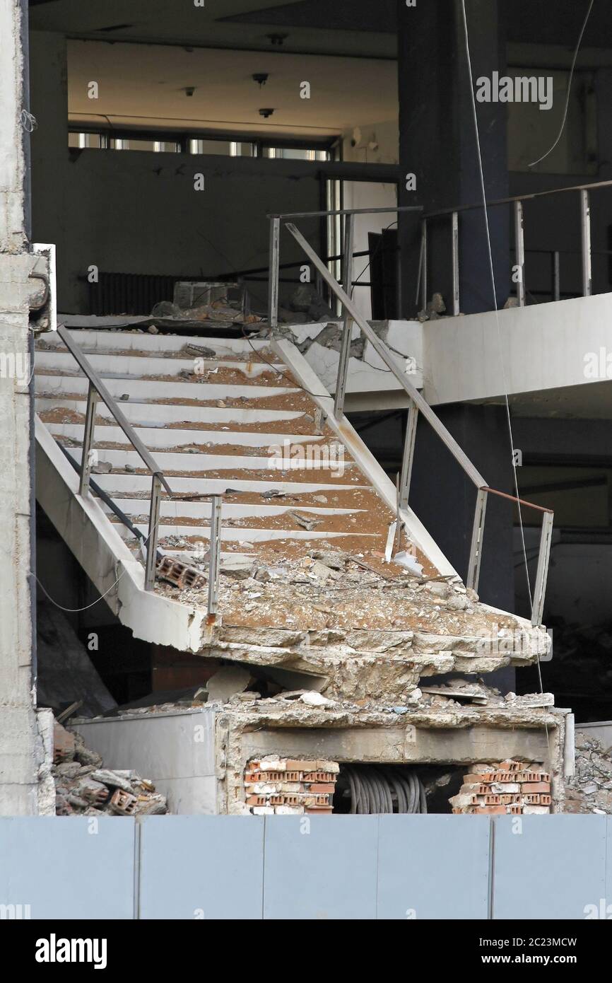 Demolished staircase in modern building after serious earthquake Stock ...