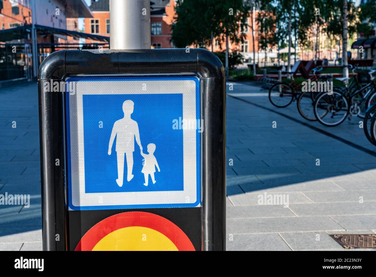 Pedestrian traffic sign - men with child in a blue square, keep hand ...