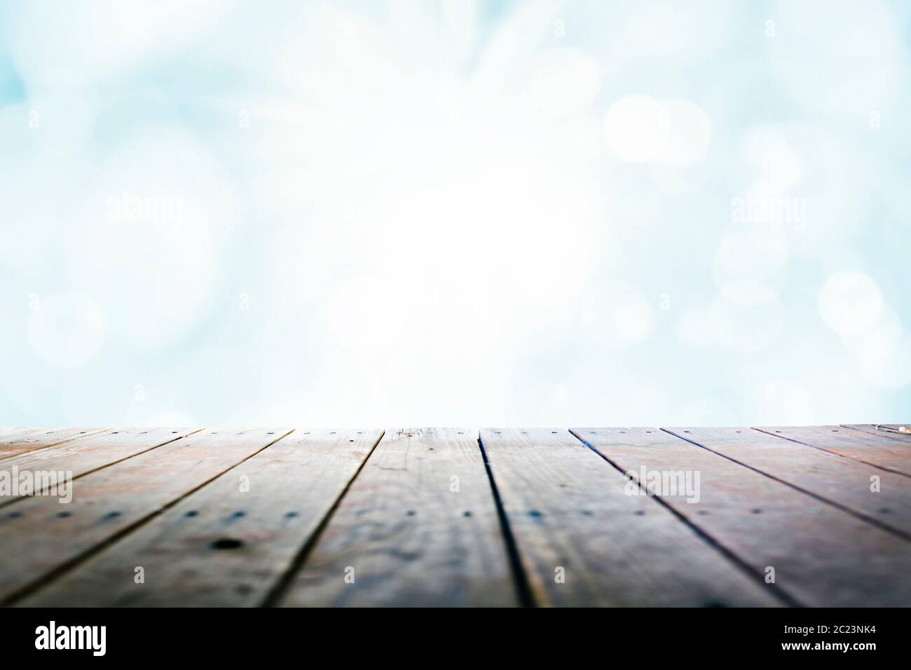 Sunny blue sky over wooden deck background Stock Photo - Alamy