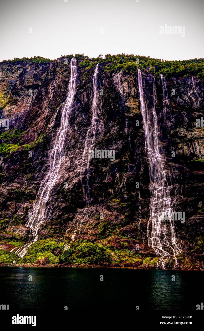 panoramic view to Seven Sisters waterfall and Geirangerfjord in Norway ...