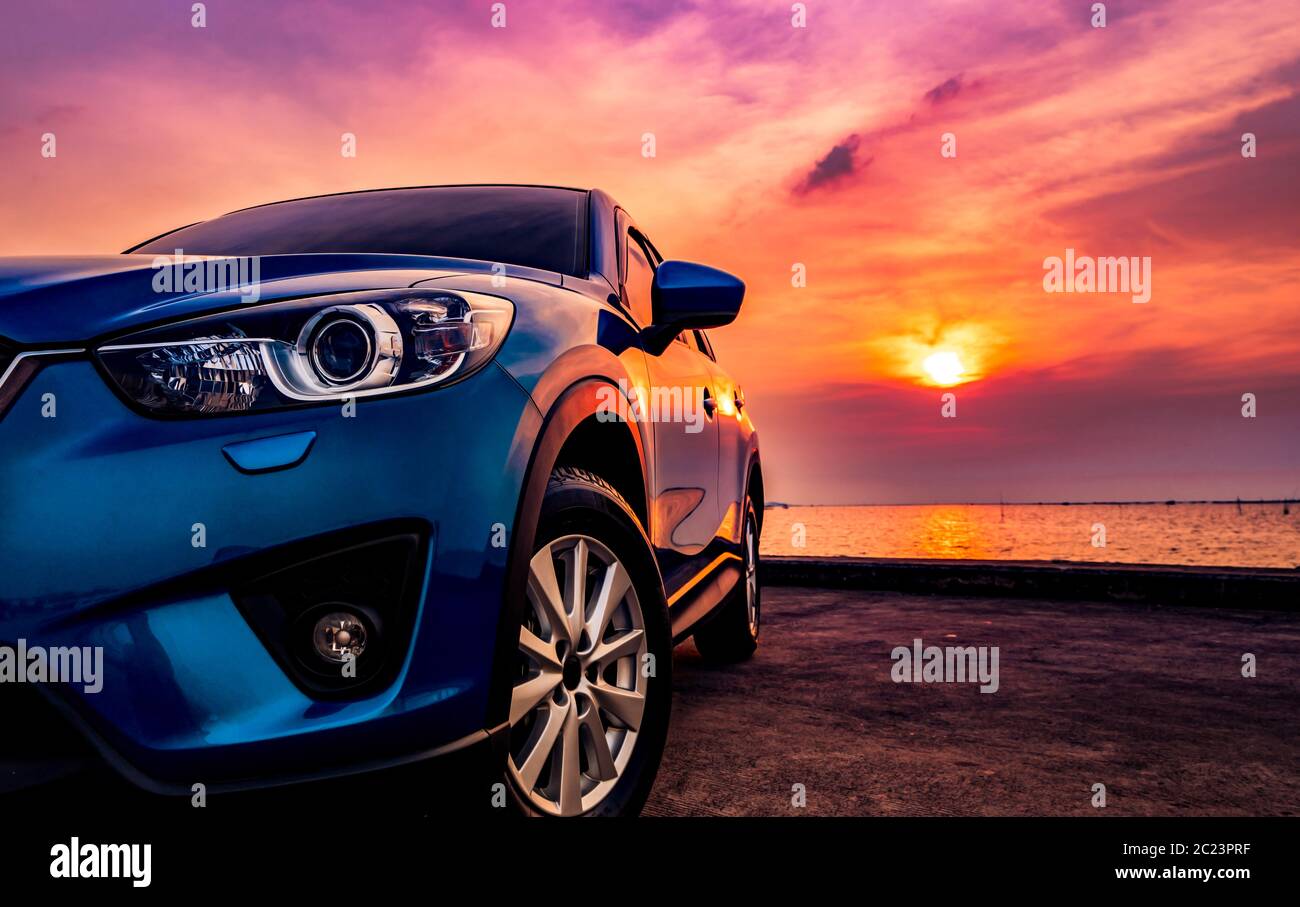 Blue compact SUV car with sport and modern design parked on concrete ...