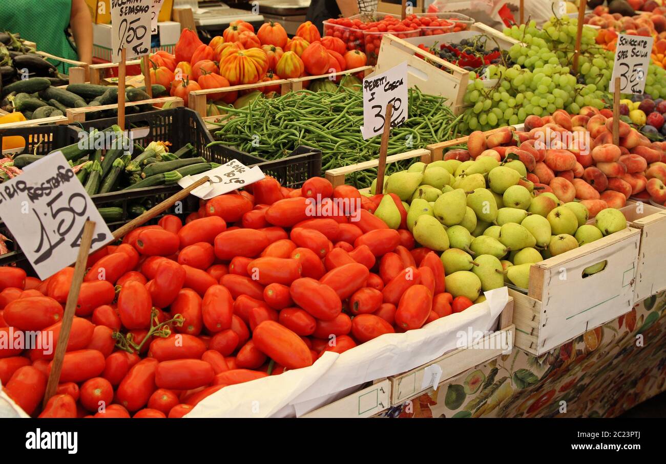 Big farmers market stall filled with organic fruits and vegetables ...