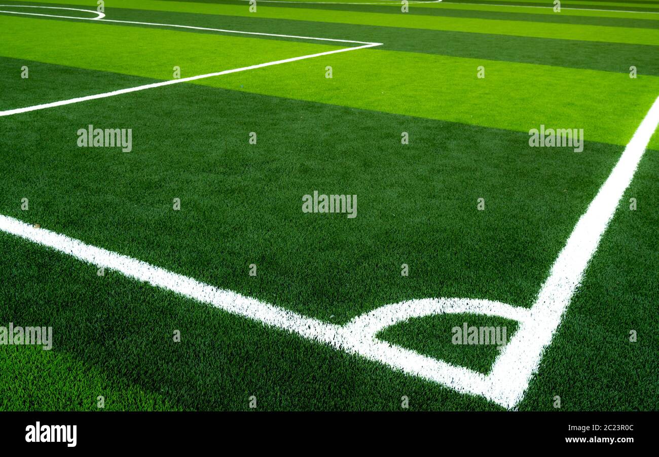 Green grass soccer field. Empty artificial turf football field with ...