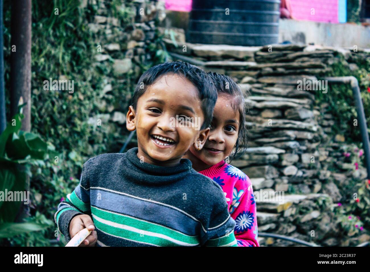 Nepalese children play in village hi-res stock photography and images ...