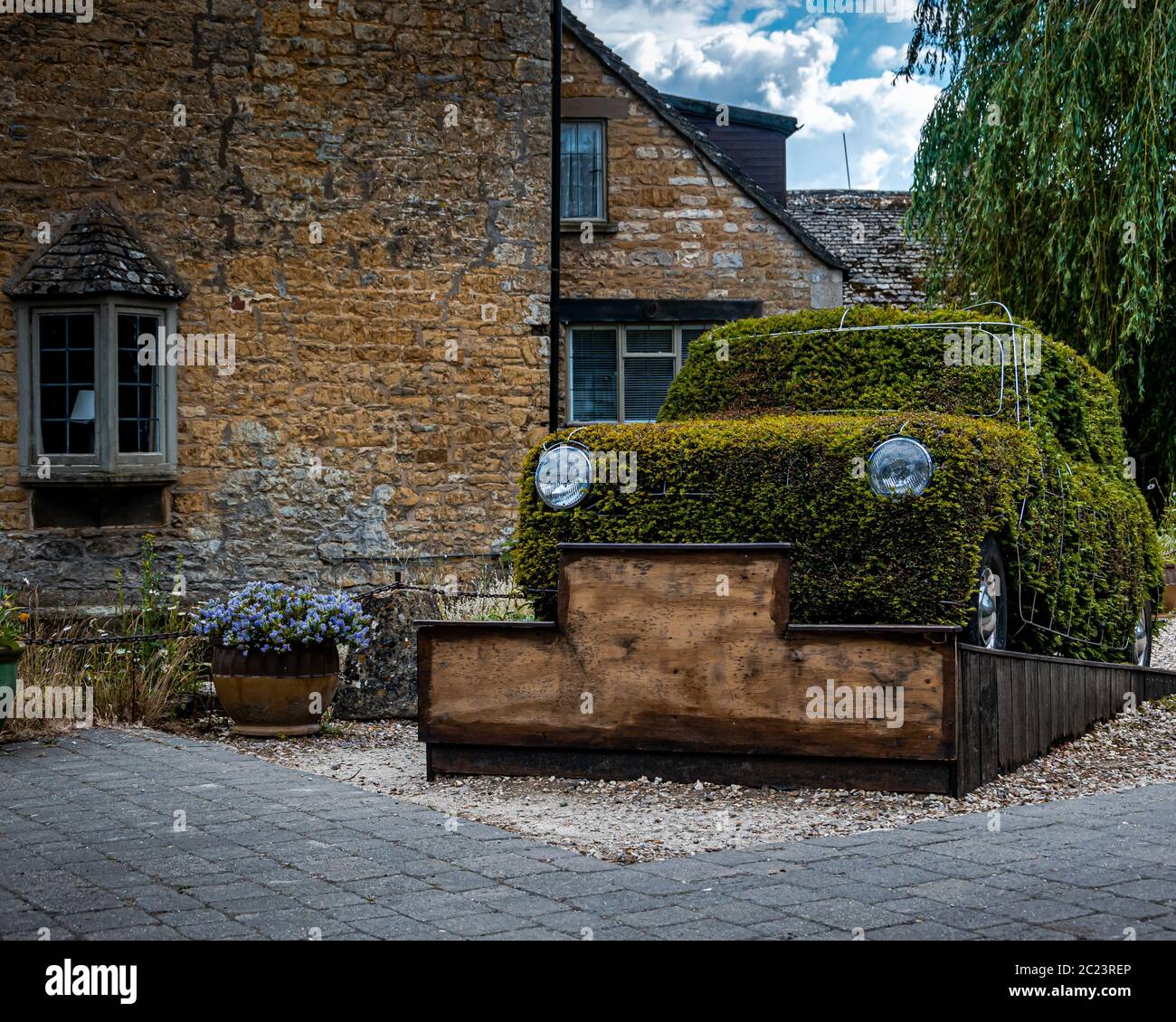 Car covered grass hi-res stock photography and images - Alamy