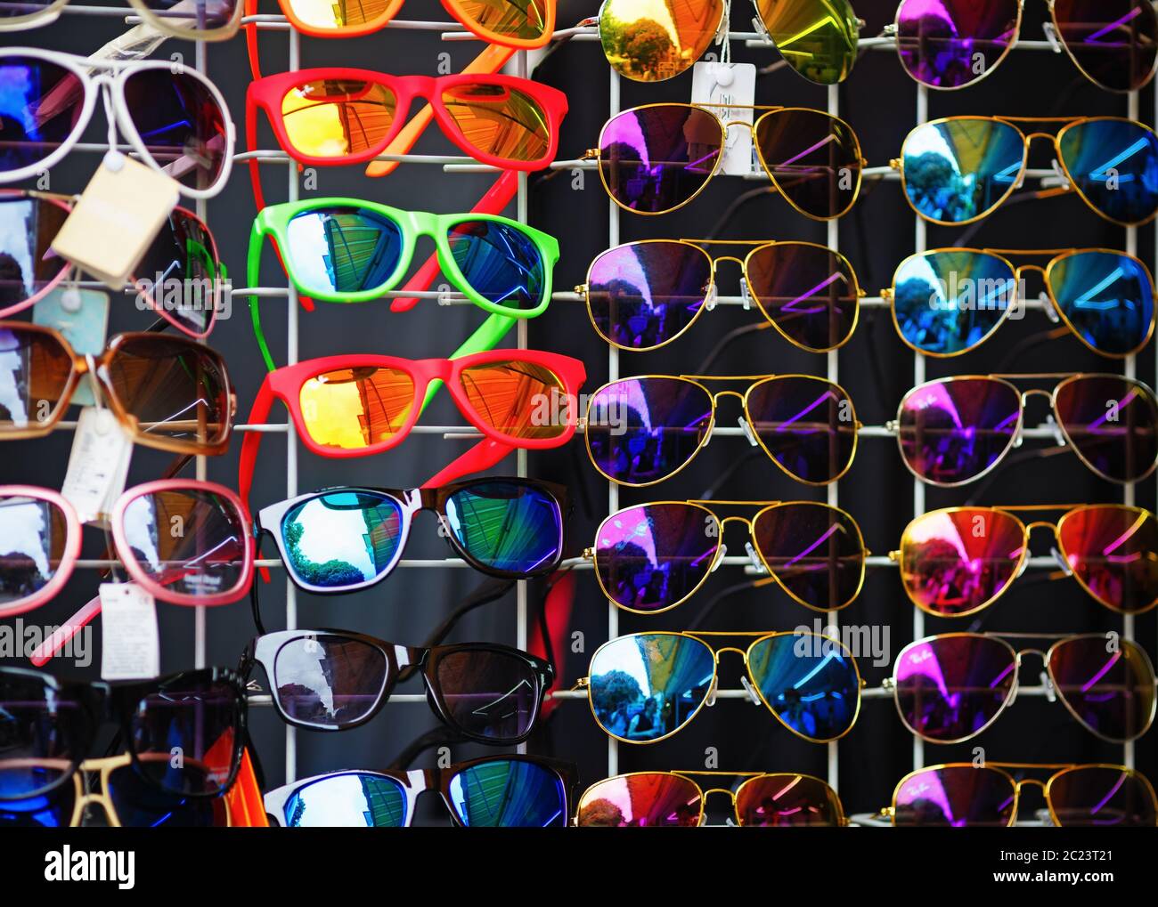 Many colorful sunglasses Stock Photo - Alamy