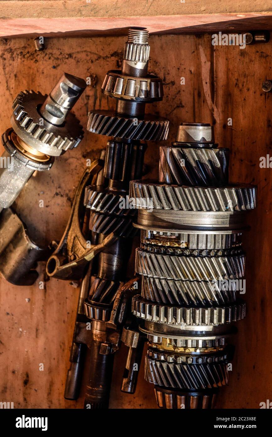 Dismantled box car transmissions. The gears on the shaft of a ...