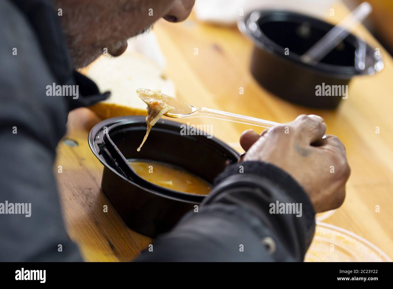Sharing soup hi-res stock photography and images - Alamy