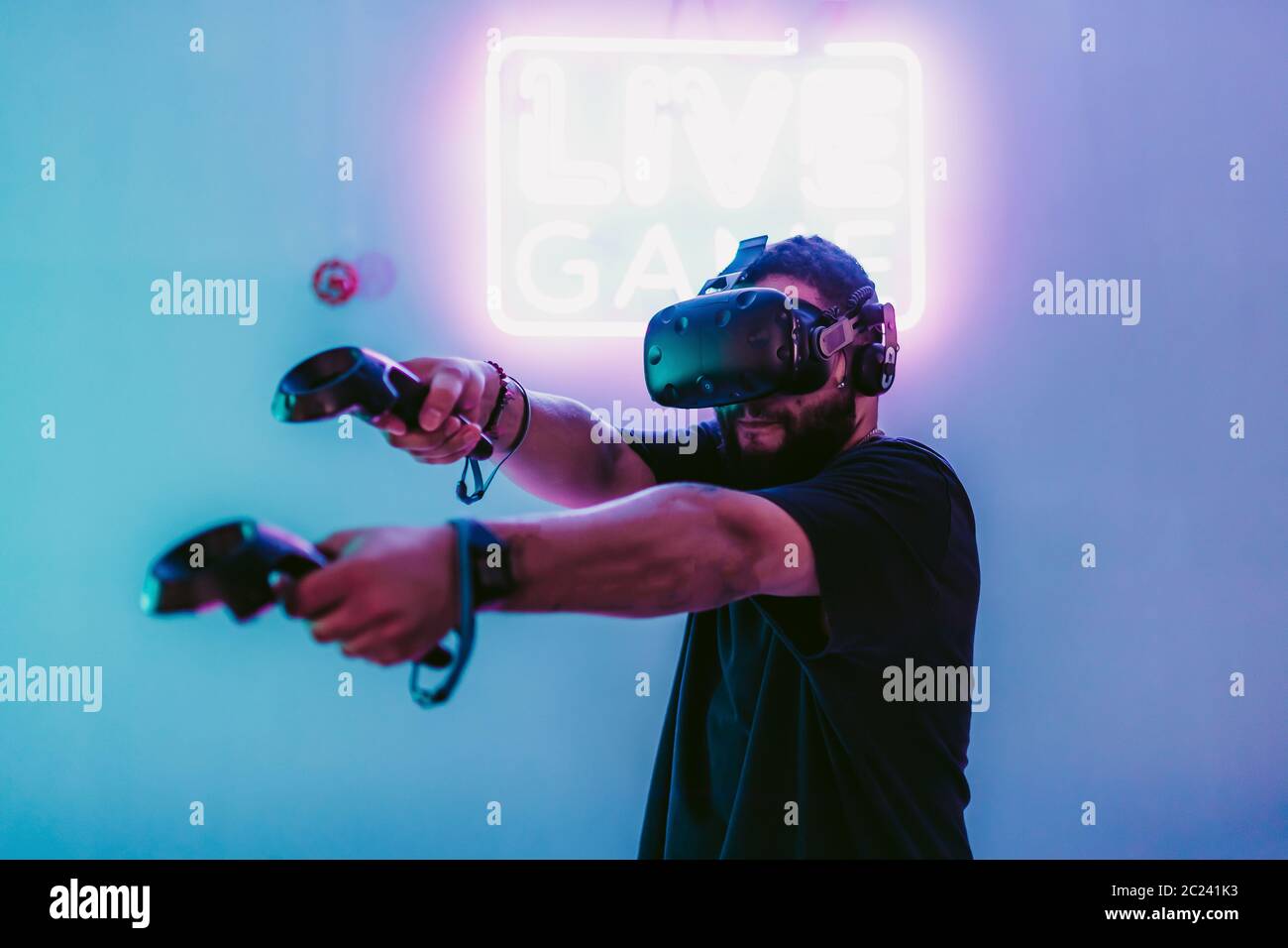 Virtual reality. The guy is playing VR games. High quality photo Stock ...