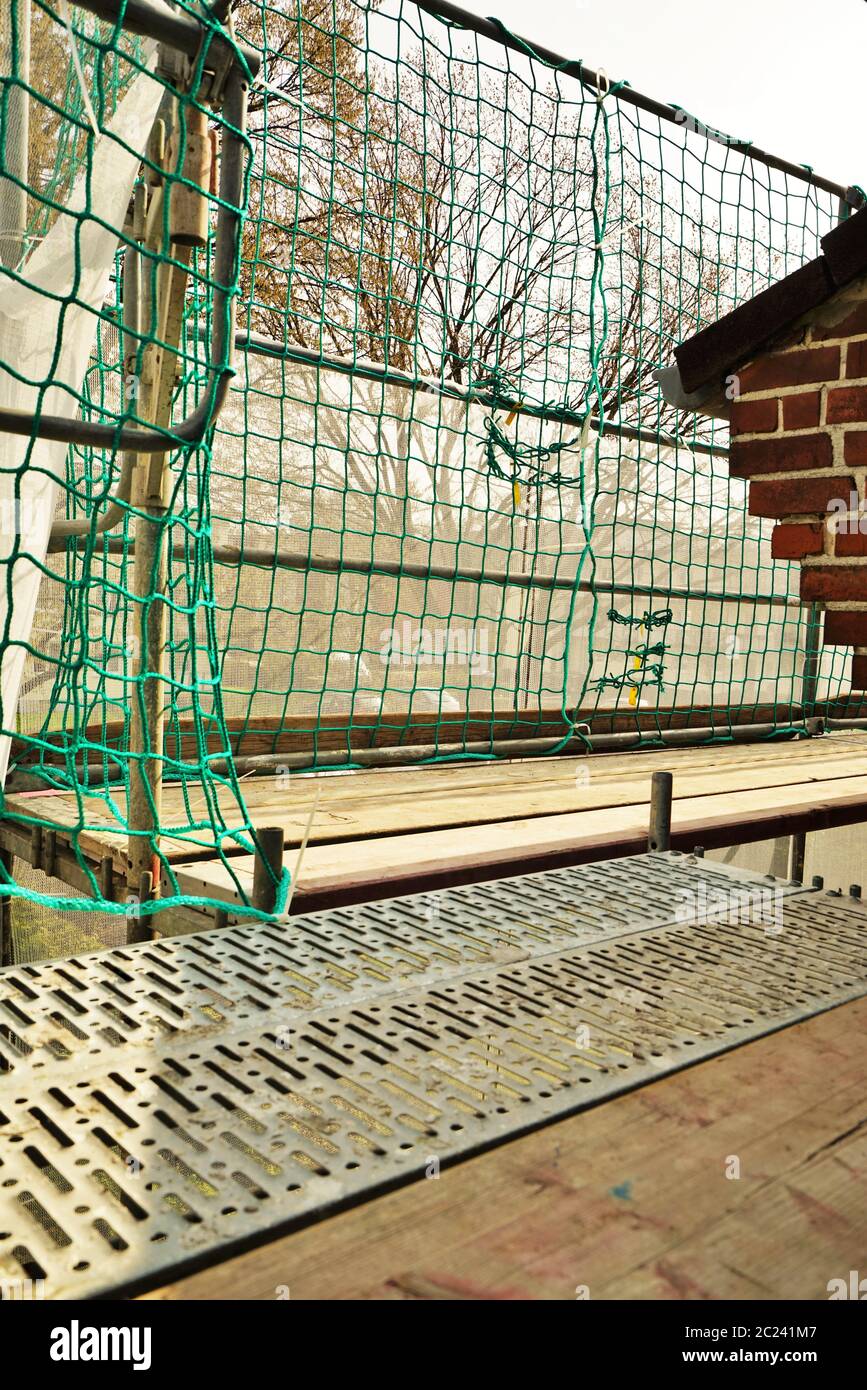 Scaffolding on a house wall Stock Photo - Alamy