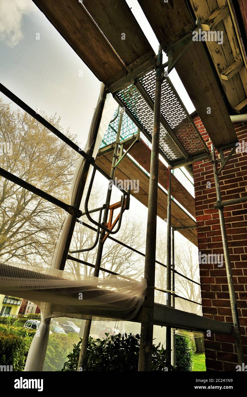 Scaffolding on a house wall Stock Photo - Alamy