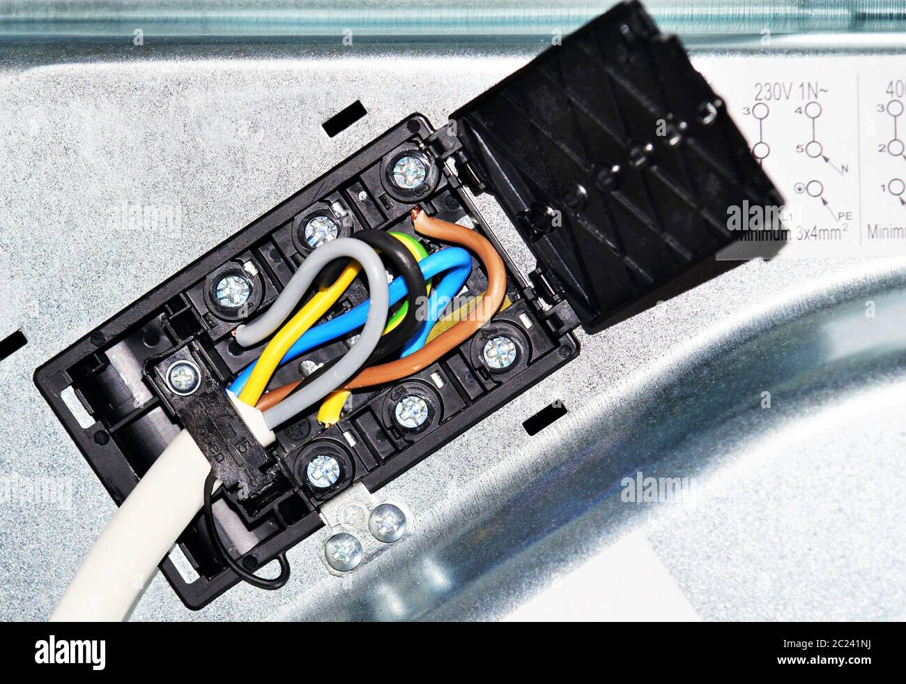 New stove connection with a power cable Stock Photo - Alamy