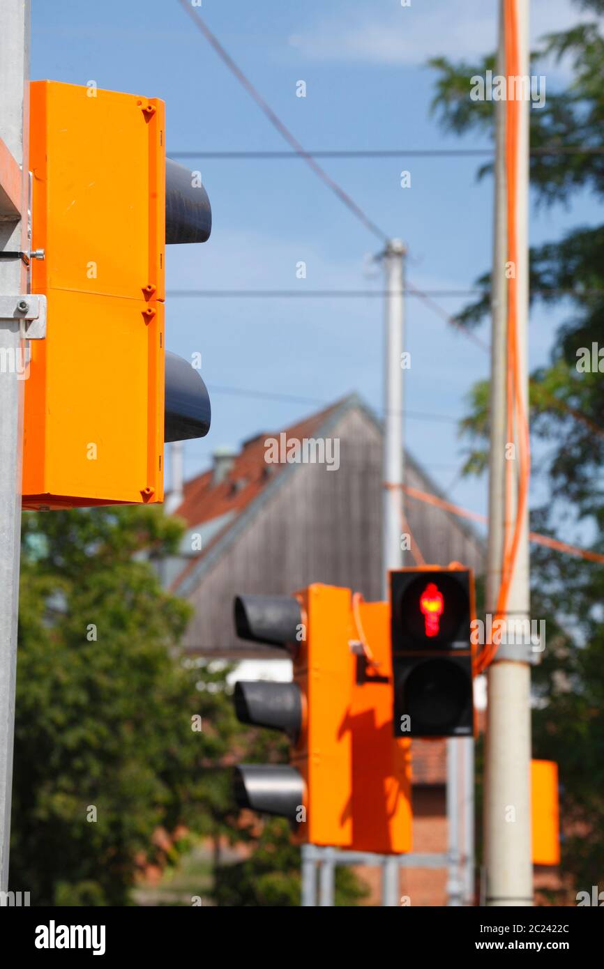 Construction site traffic light switched to red, traffic sign ...